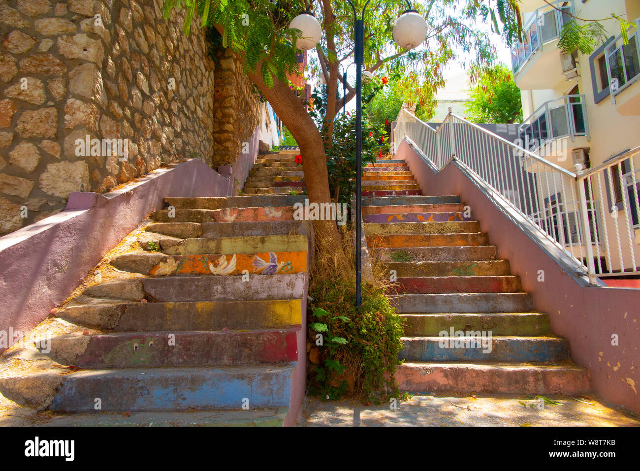 Painted and brightly coloured steps in the harbour town and popular ...