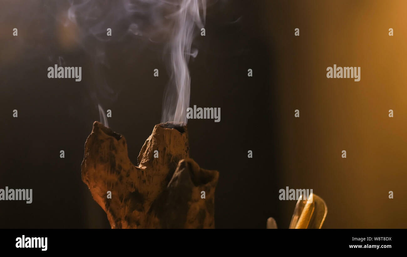 Incense stick burning with smoke Stock Photo - Alamy