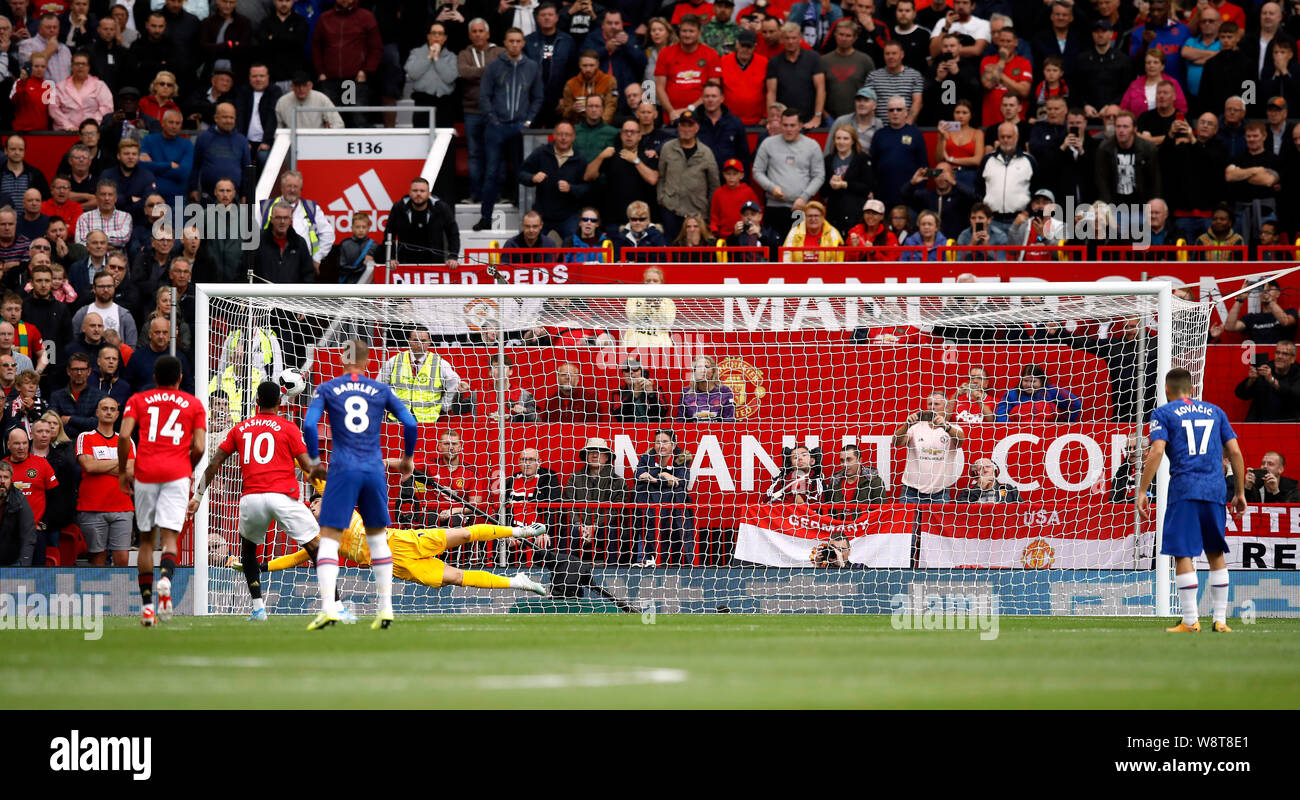 Manchester United's Marcus Rashford scores his side's first goal of the ...