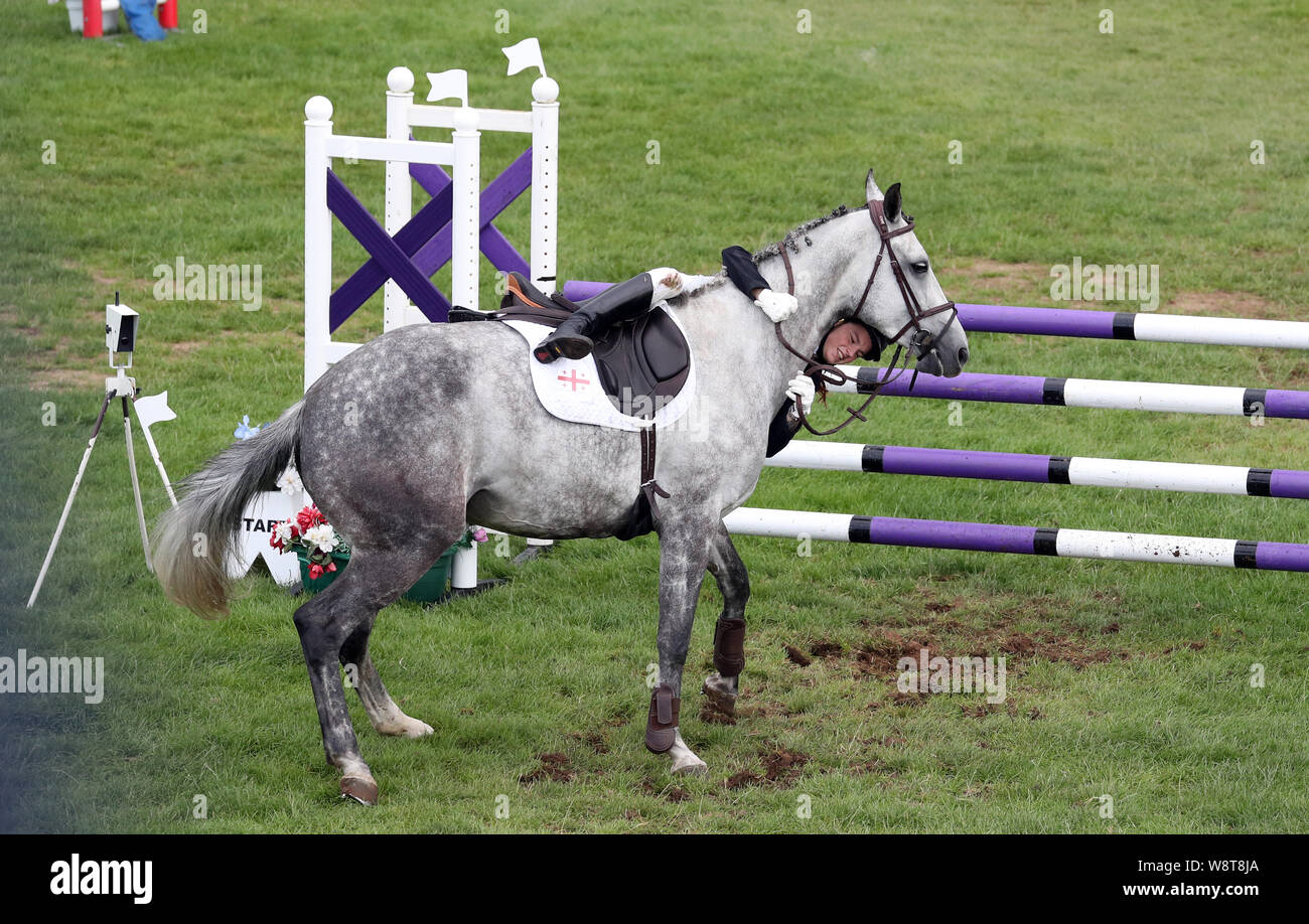 Georgia's Polina Matyukhevich manages to hold on to her horse during ...