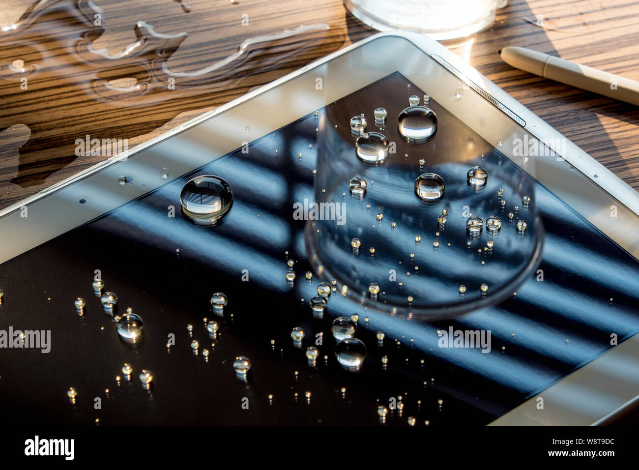 Spilled glass of water still life hi-res stock photography and images ...
