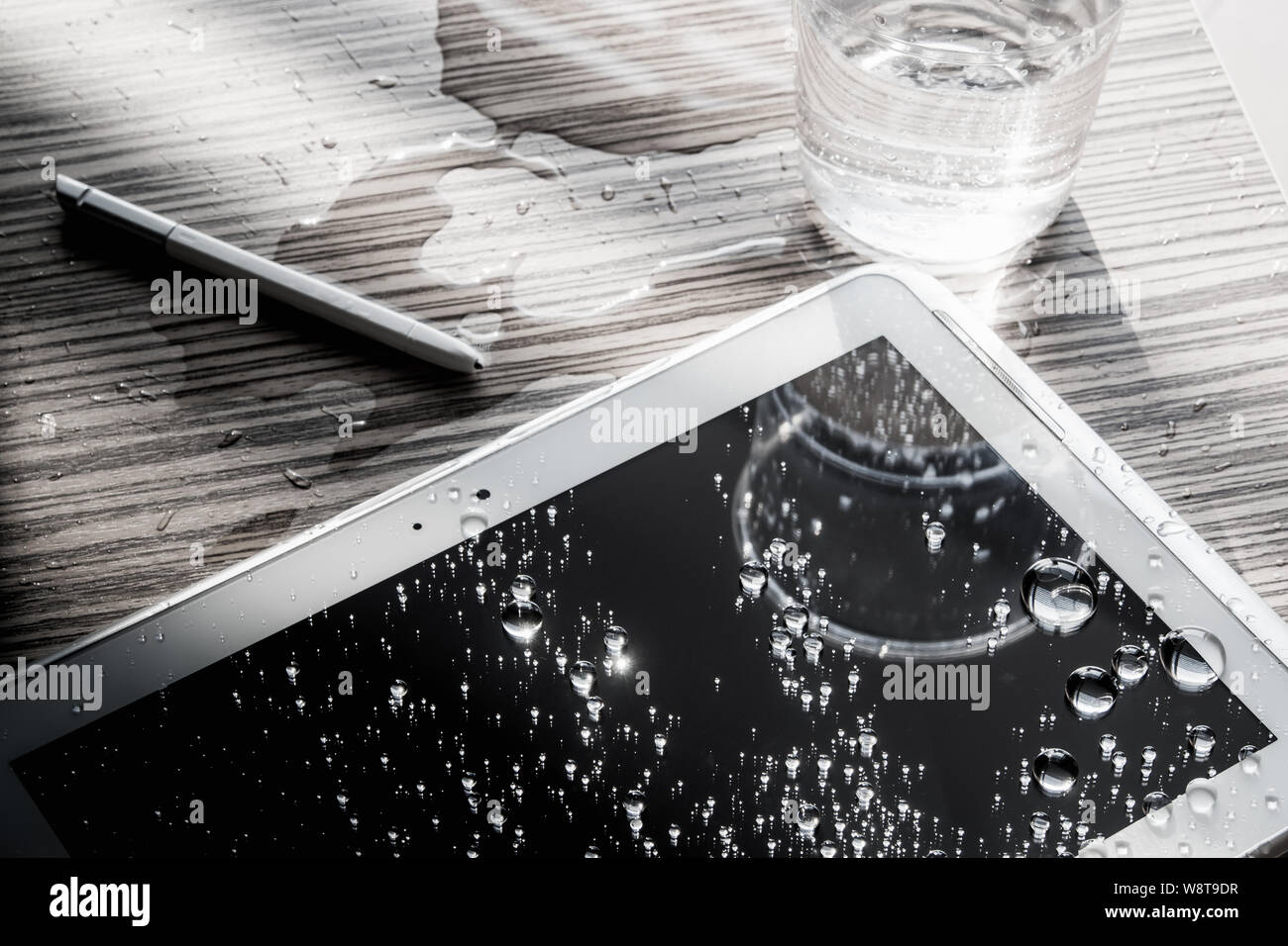 Spilled glass of water still life hi-res stock photography and images ...