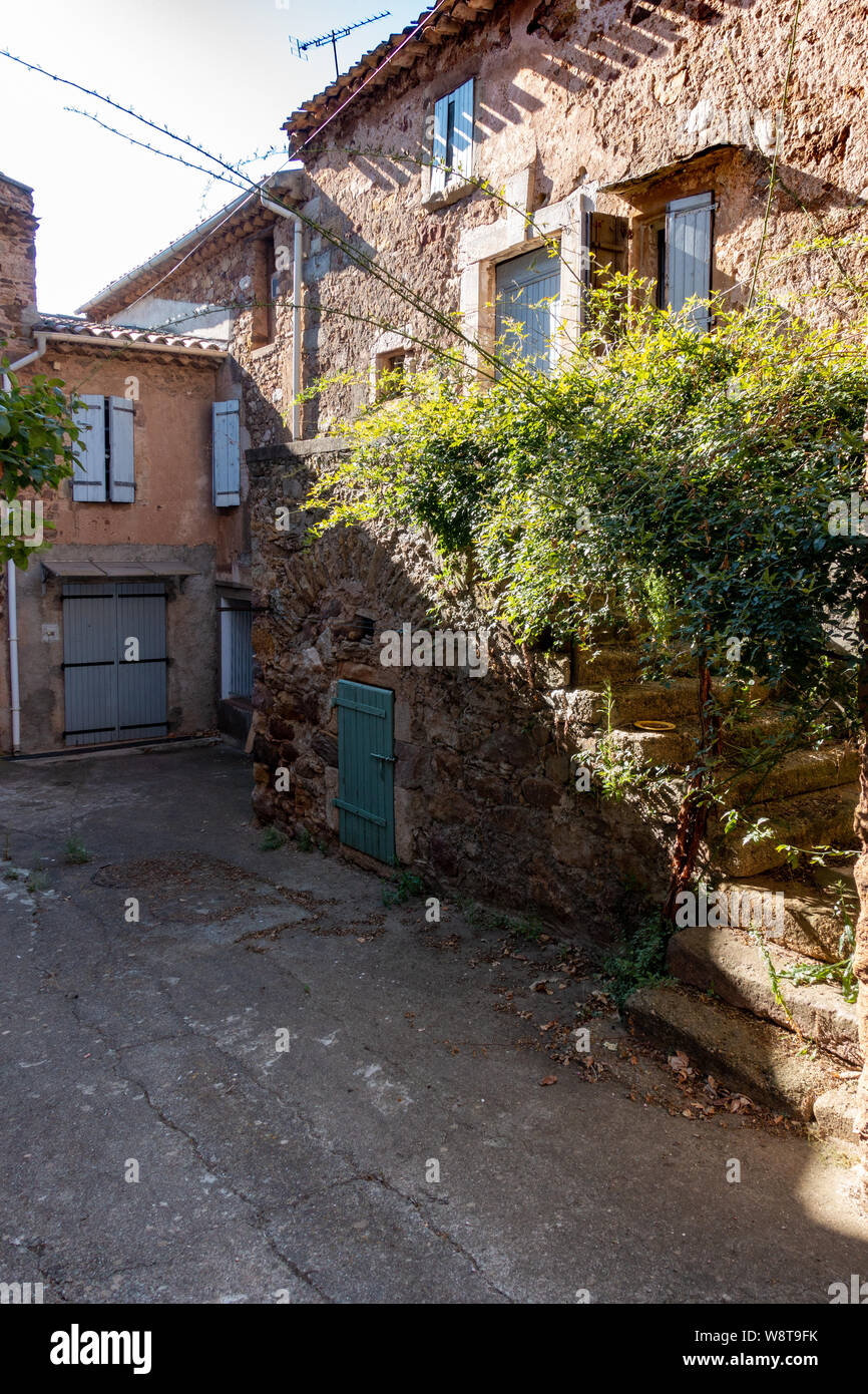 French houses in village street scene Stock Photo - Alamy