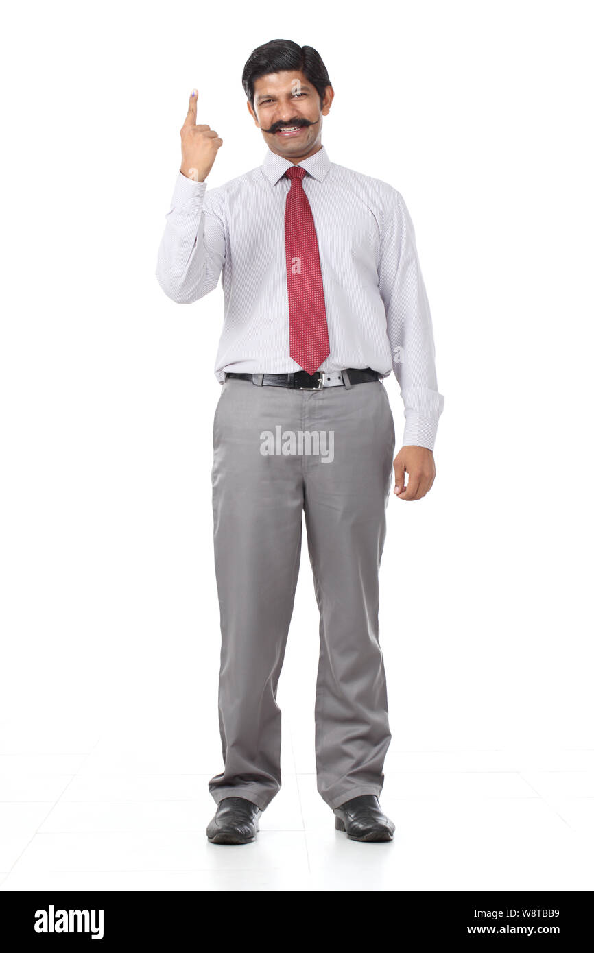 Middle aged businessman pointing finger hi-res stock photography and images - Alamy