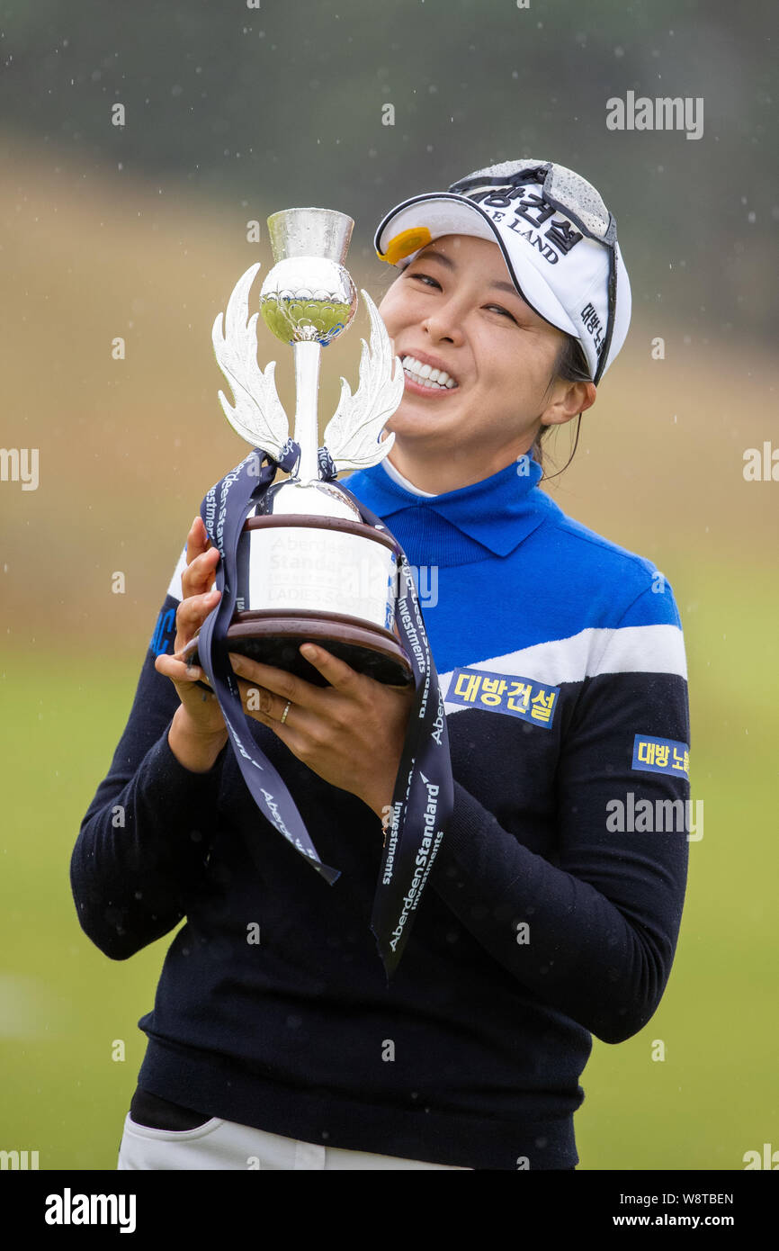 South Korea's Mi Jung Hur celebrates with the trophy on day four of the ...