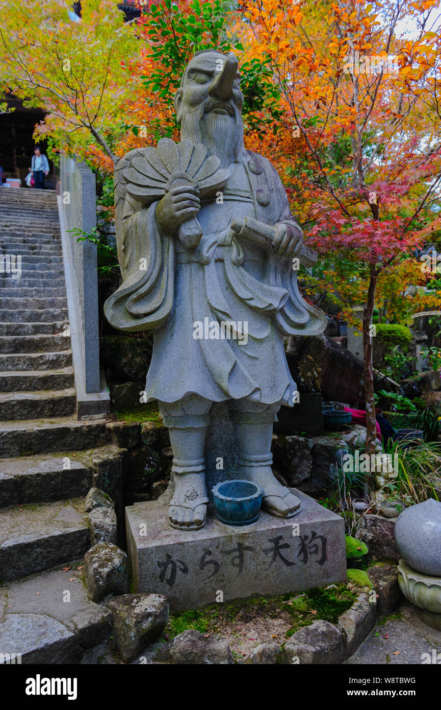 Impressive stone statue of a japanese mythical creature, called Tengu ...