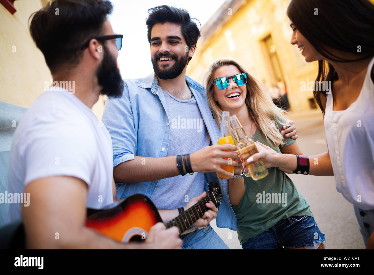 Group of friends having fun and spending good time together Stock Photo ...