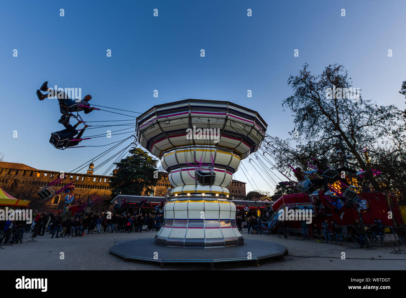 a swinging fair ride in Milan , Italy Stock Photo - Alamy
