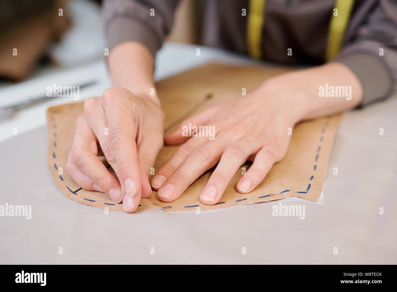 Pinning fabric hi-res stock photography and images - Alamy