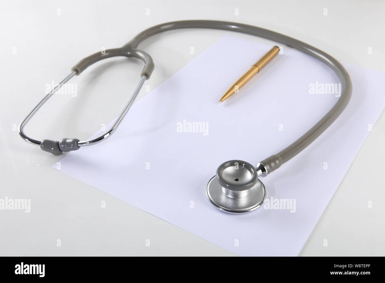 Stethoscope and pen on a paper Stock Photo - Alamy