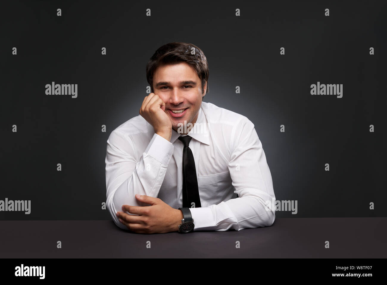 Portrait of a businessman smiling Stock Photo - Alamy