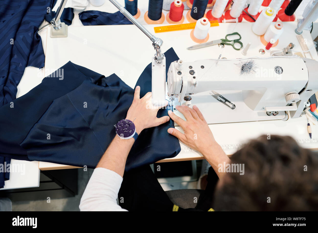 Man sewing hi-res stock photography and images - Alamy