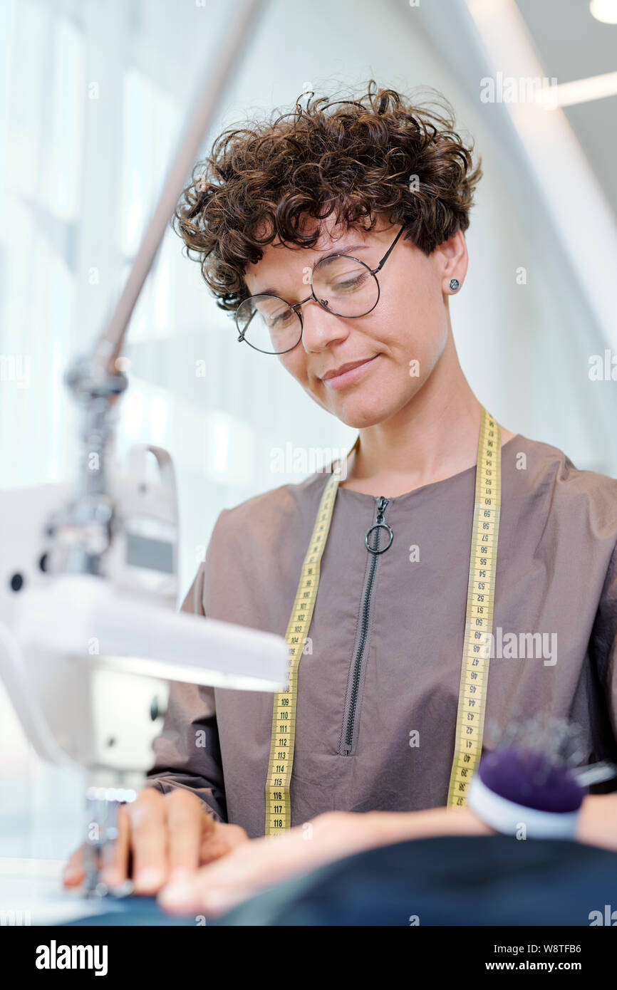 Portrait professional seamstress woman working hi-res stock photography ...