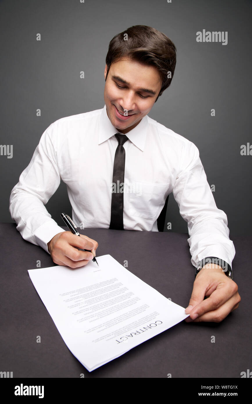 Authority sitting document agreement signing hi-res stock photography ...