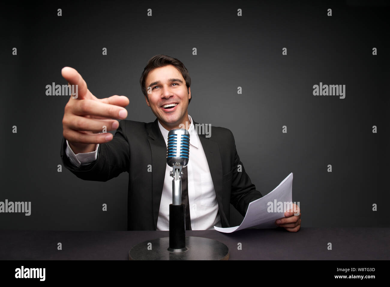 Television broadcaster in newsroom Stock Photo - Alamy