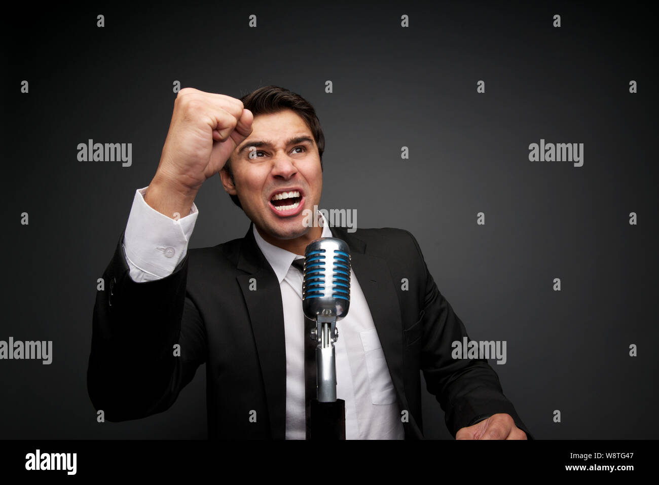 Television broadcaster shouting in newsroom Stock Photo - Alamy