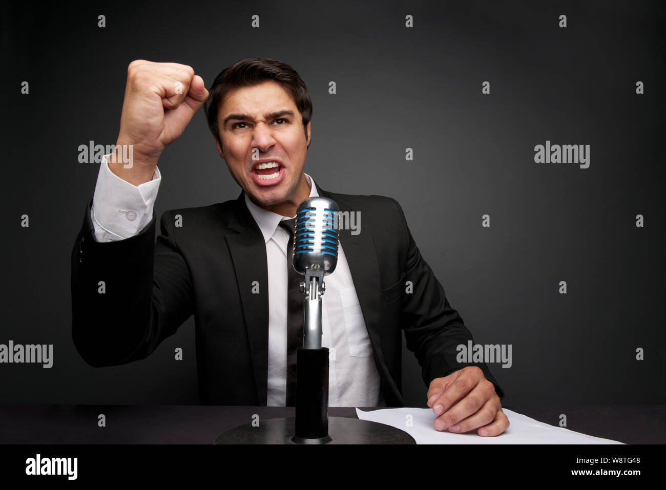 Television broadcaster shouting in newsroom Stock Photo - Alamy