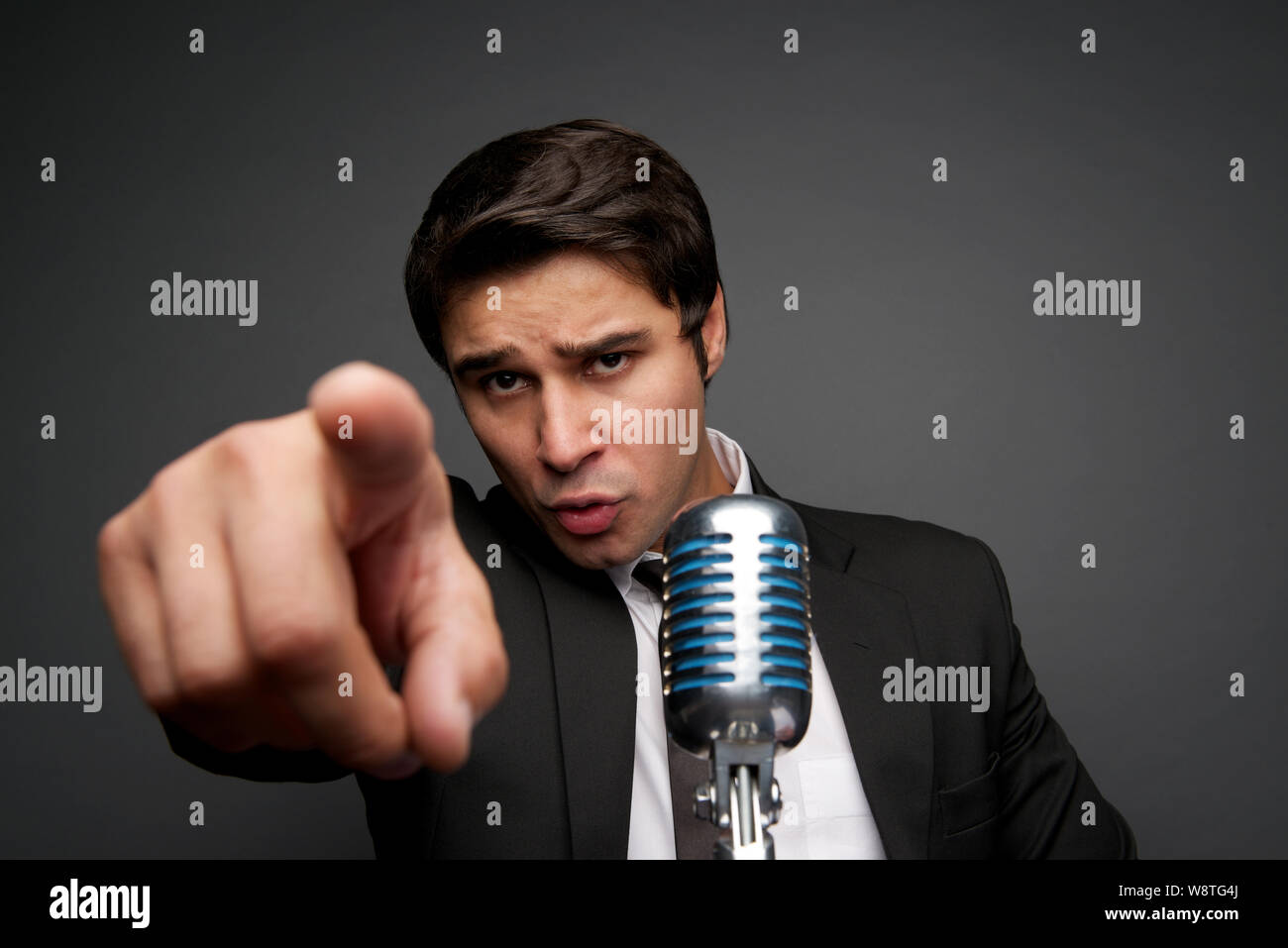 Television broadcaster blaming Stock Photo - Alamy