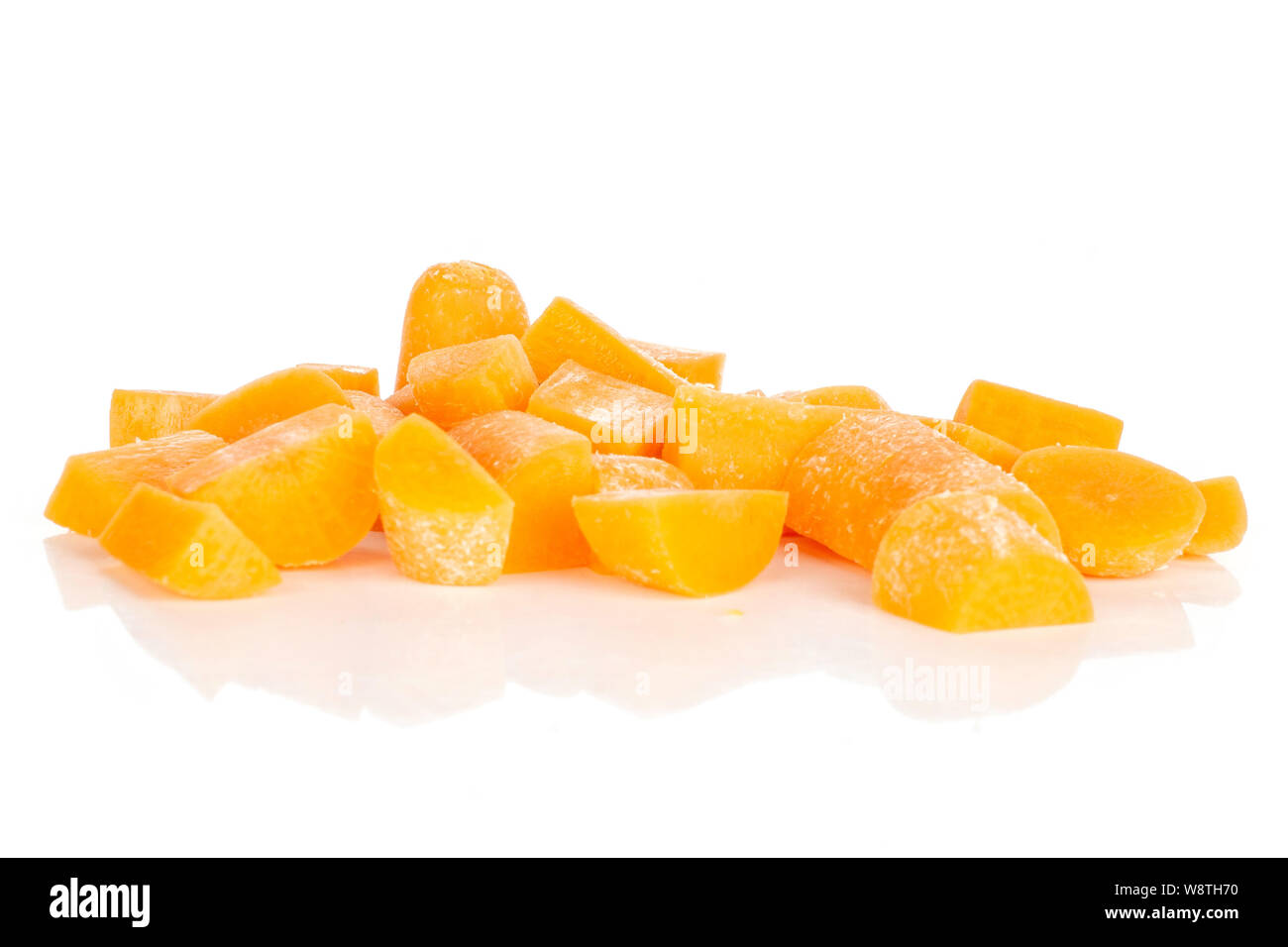 Lot of pieces of stale orange stale baby carrot baby isolated on white ...