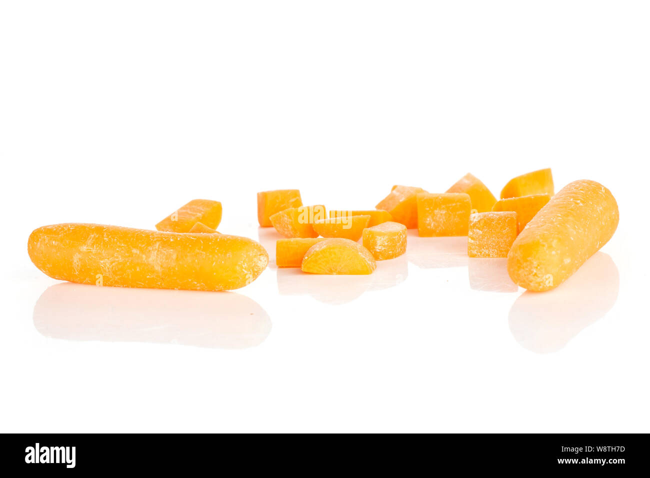 Group of two whole lot of pieces of stale orange stale baby carrot baby ...