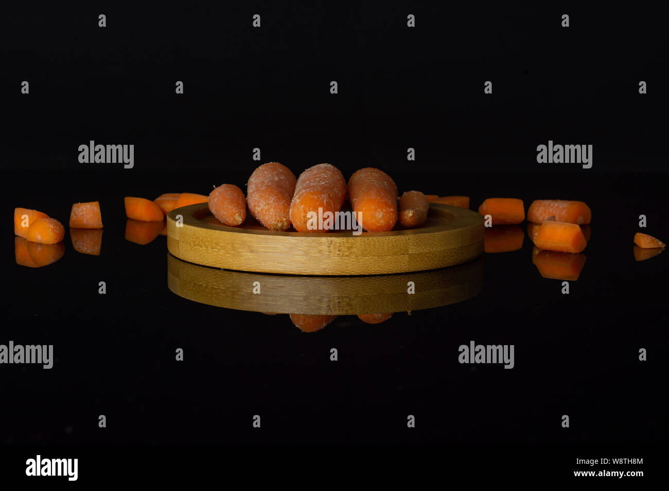 Group of five whole lot of pieces of stale orange stale baby carrot ...