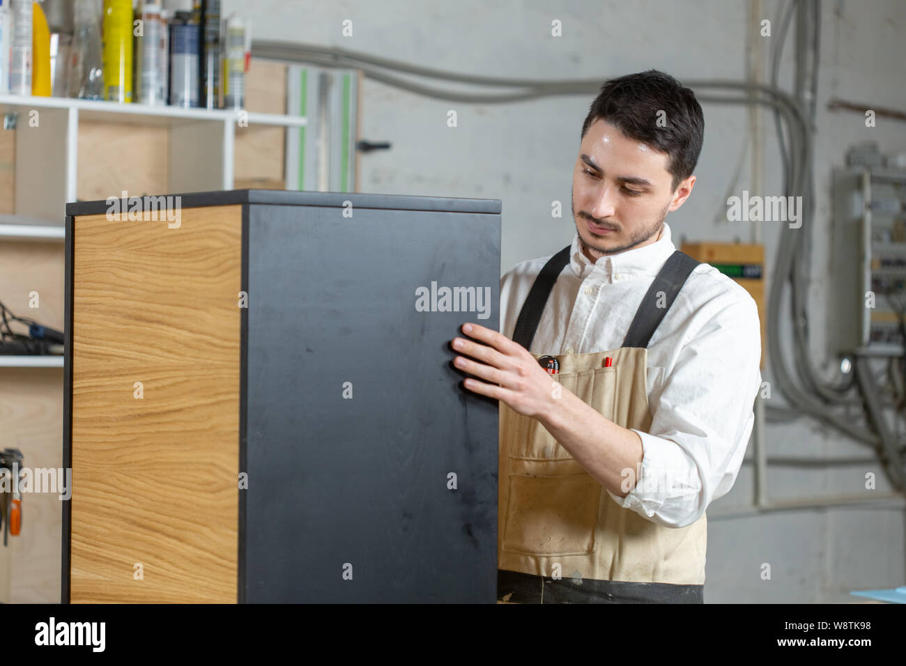 Furniture factory and small and medium sized enterprises concept - Man ...