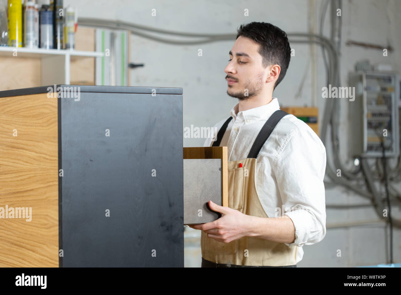 Furniture factory and small and medium sized enterprises concept - Man ...