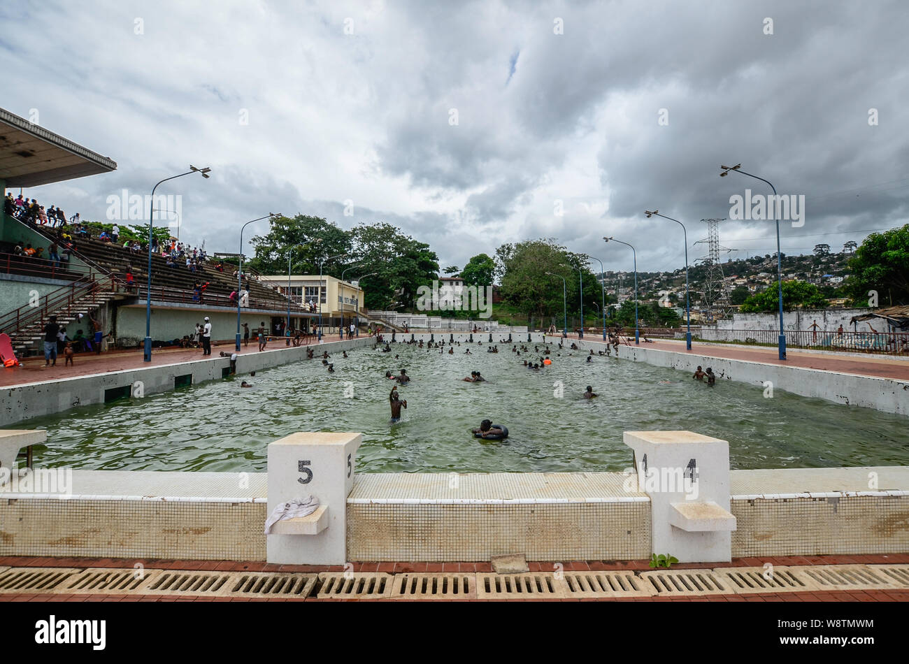 Outdoor swimming pool at the National Stadium, Freetown, Sierra Leone ...