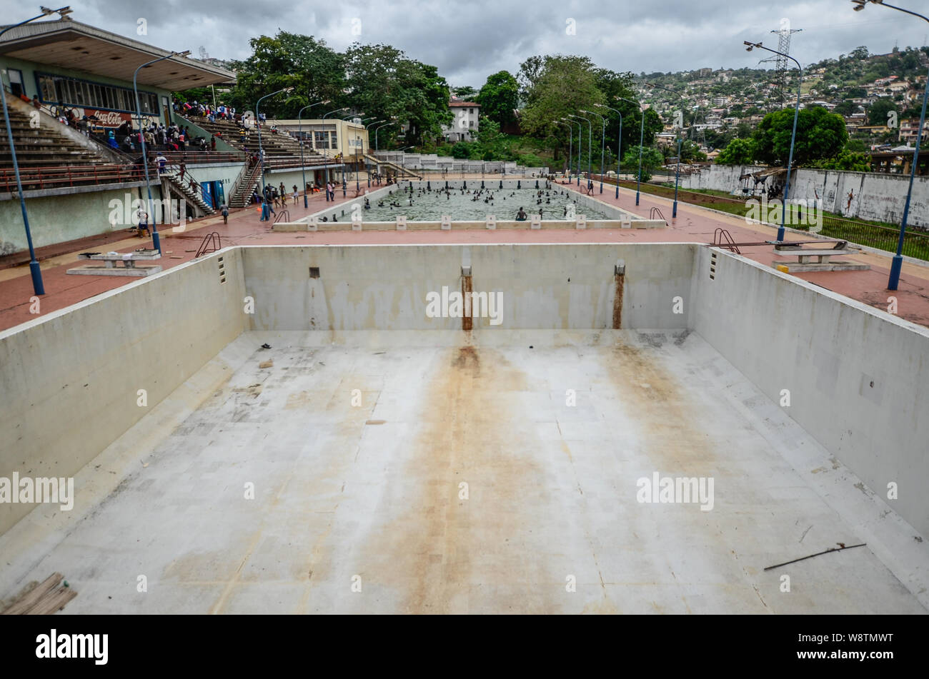 Outdoor swimming pool at the National Stadium, Freetown, Sierra Leone ...