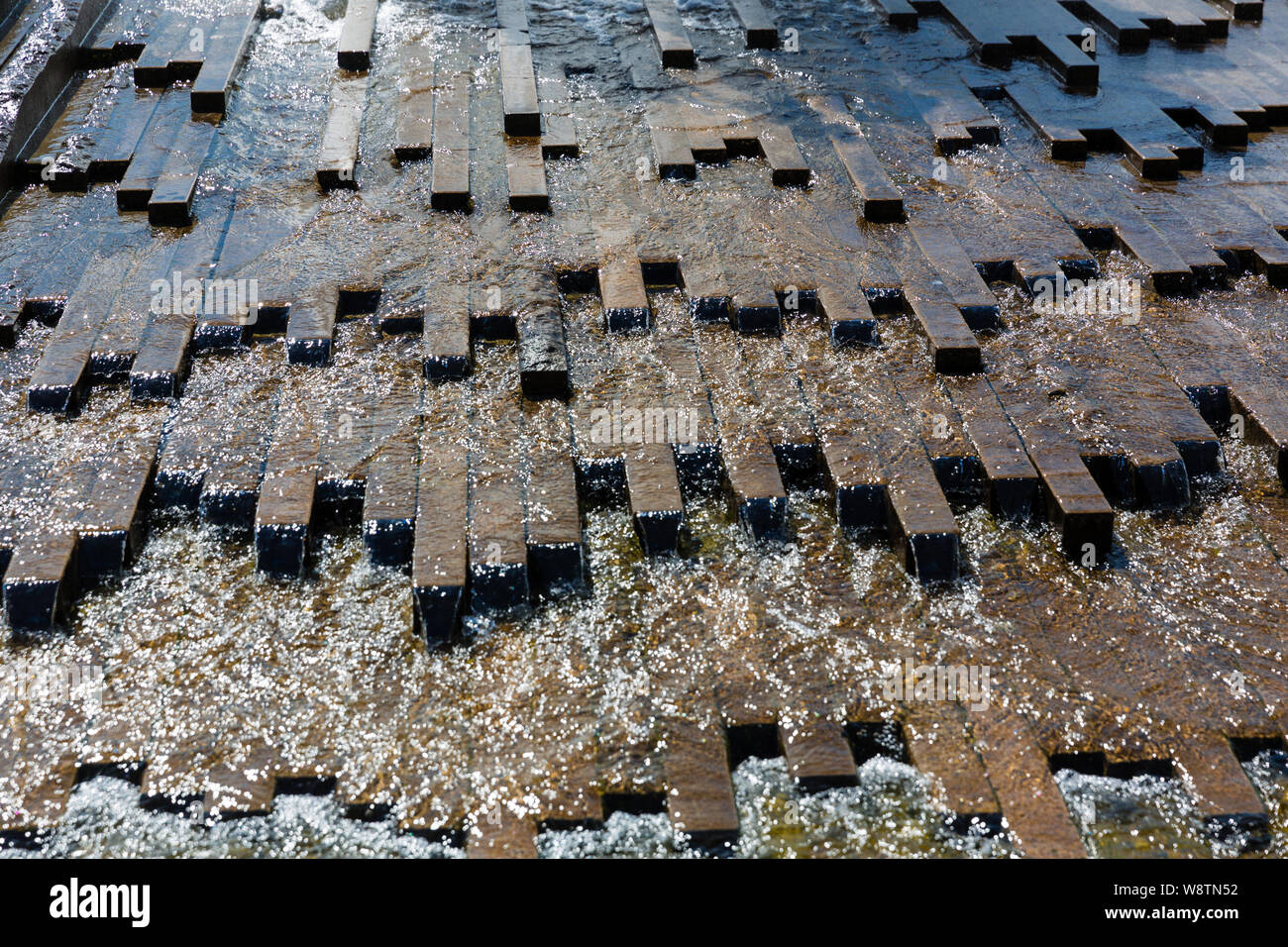 Stone slabs in fountain closeup, old European town Stock Photo - Alamy