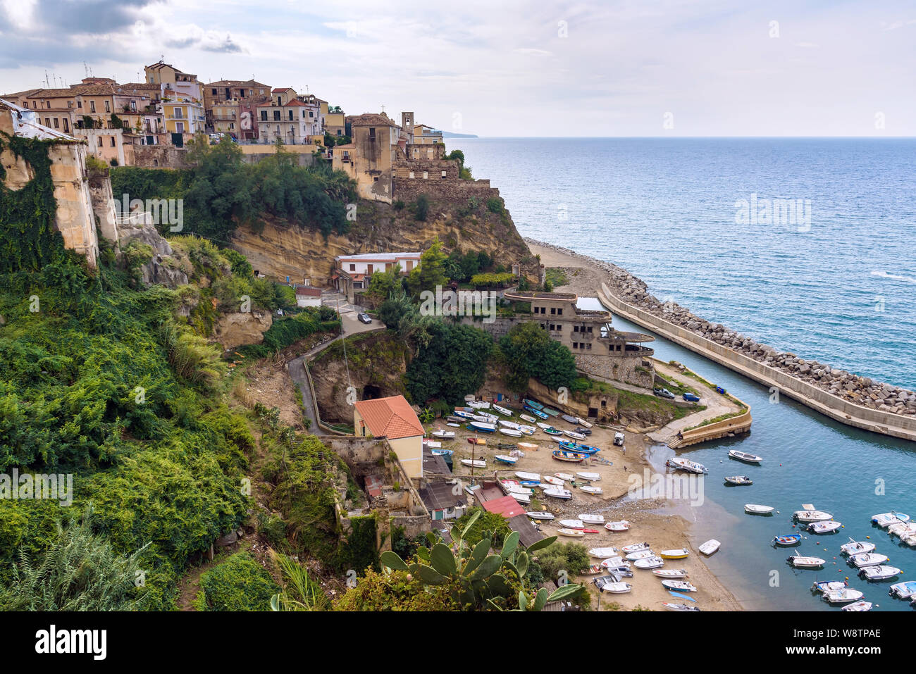 Aerial view of Pizzo town in Calabria with small boat pier at the beach ...