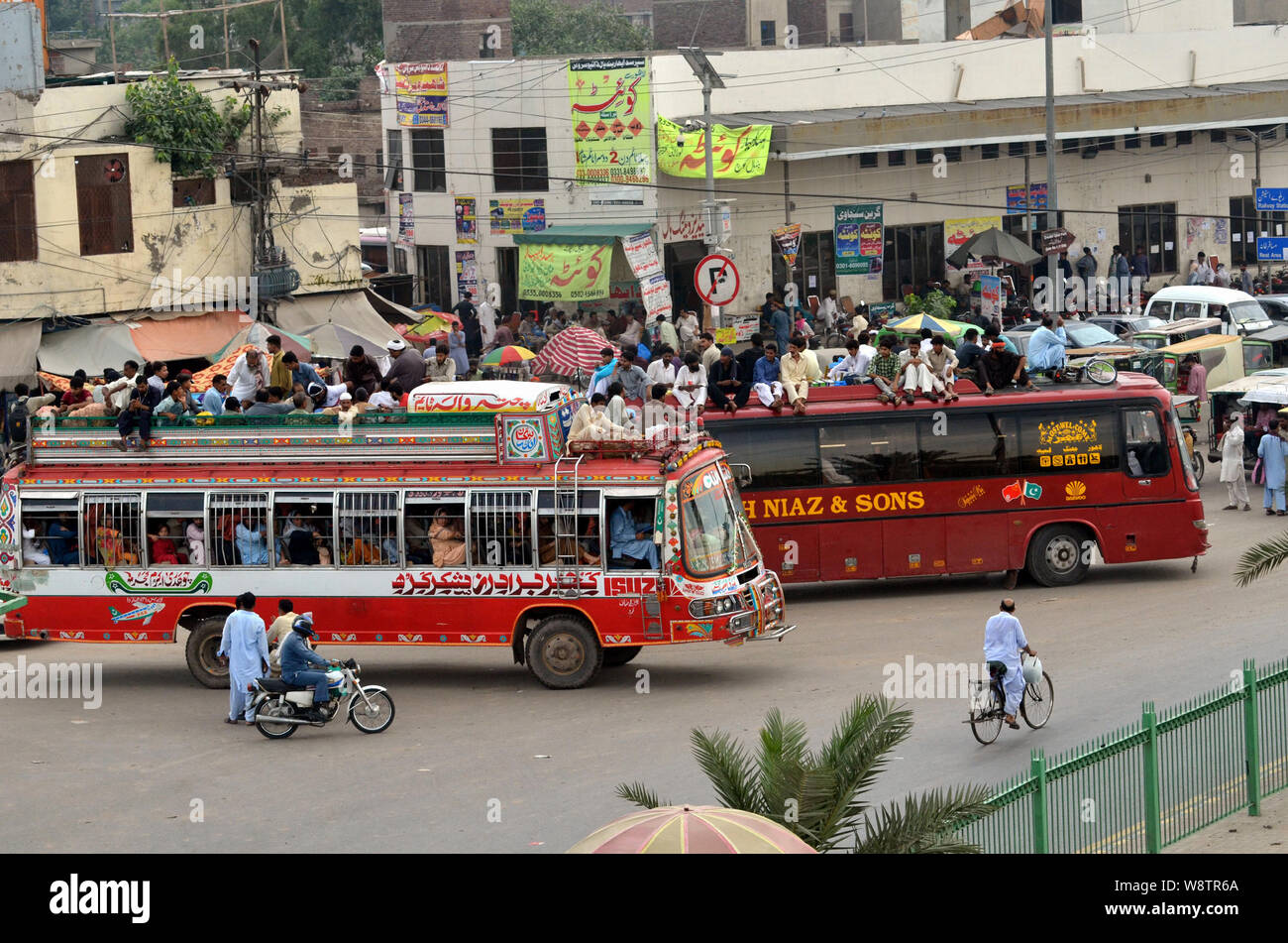 Lahore, Pakistan. 11th Aug, 2019. Passengers are seen on an overcrowded ...