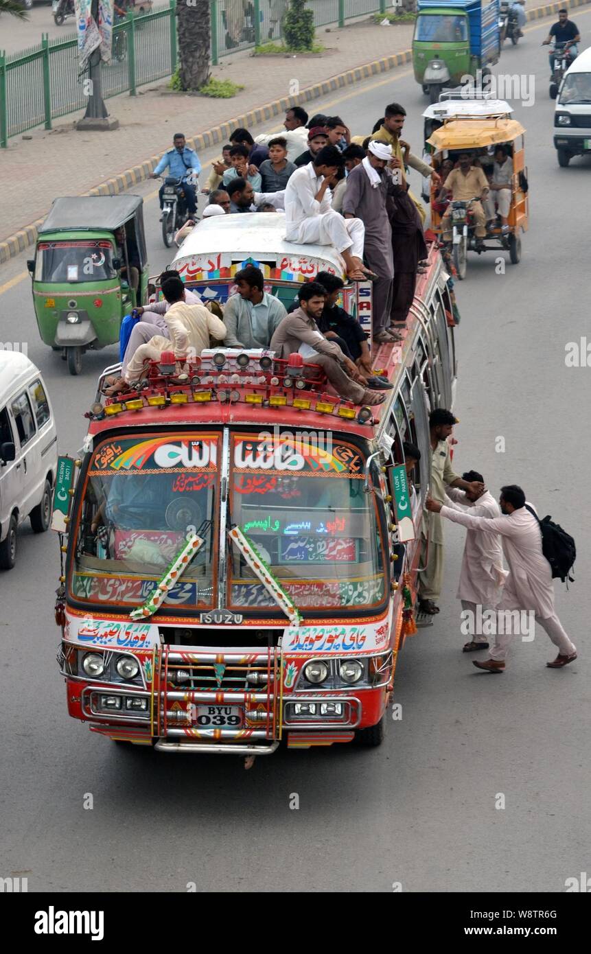 Lahore, Pakistan. 11th Aug, 2019. Passengers are seen on an overcrowded ...