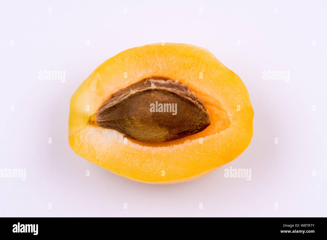 cut apricot on white background Stock Photo - Alamy