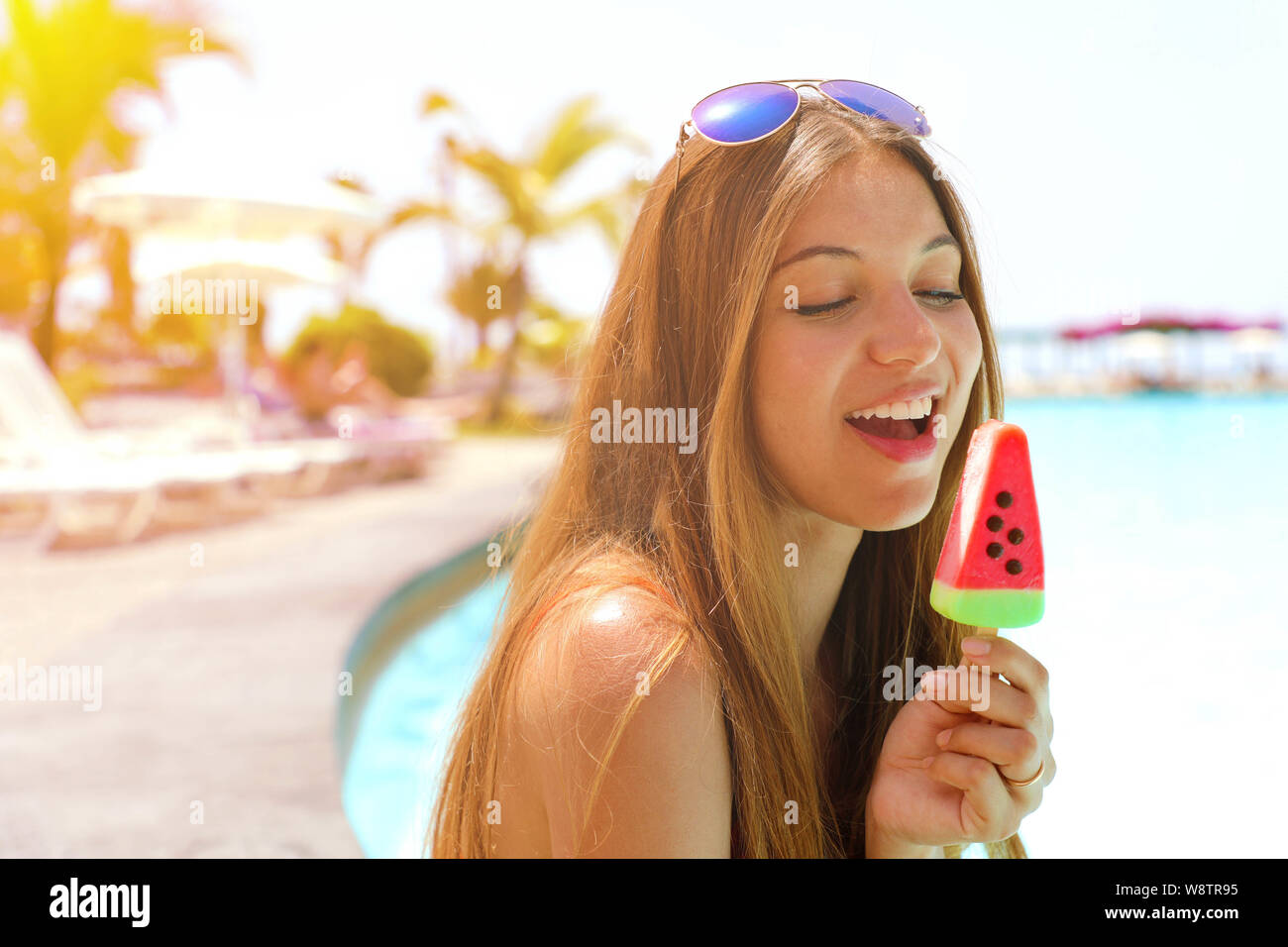 Girl eating popsicle ice cream High Resolution Stock Photography and ...