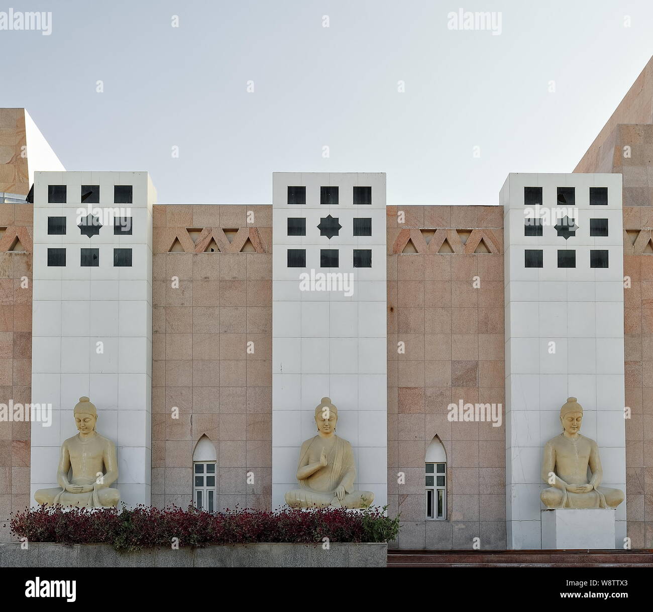 Buddha statues-N.facade of New Loulan Museum in Ruoqiang Charkhlik town ...