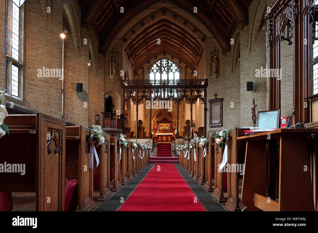 Decorated wedding aisle inside church hi-res stock photography and ...