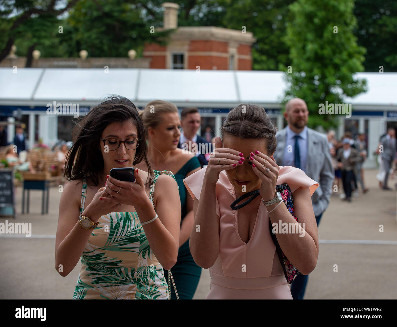 Ascot, UK. 10th August, 2019. Racegoers arrive at Ascot Races on a ...