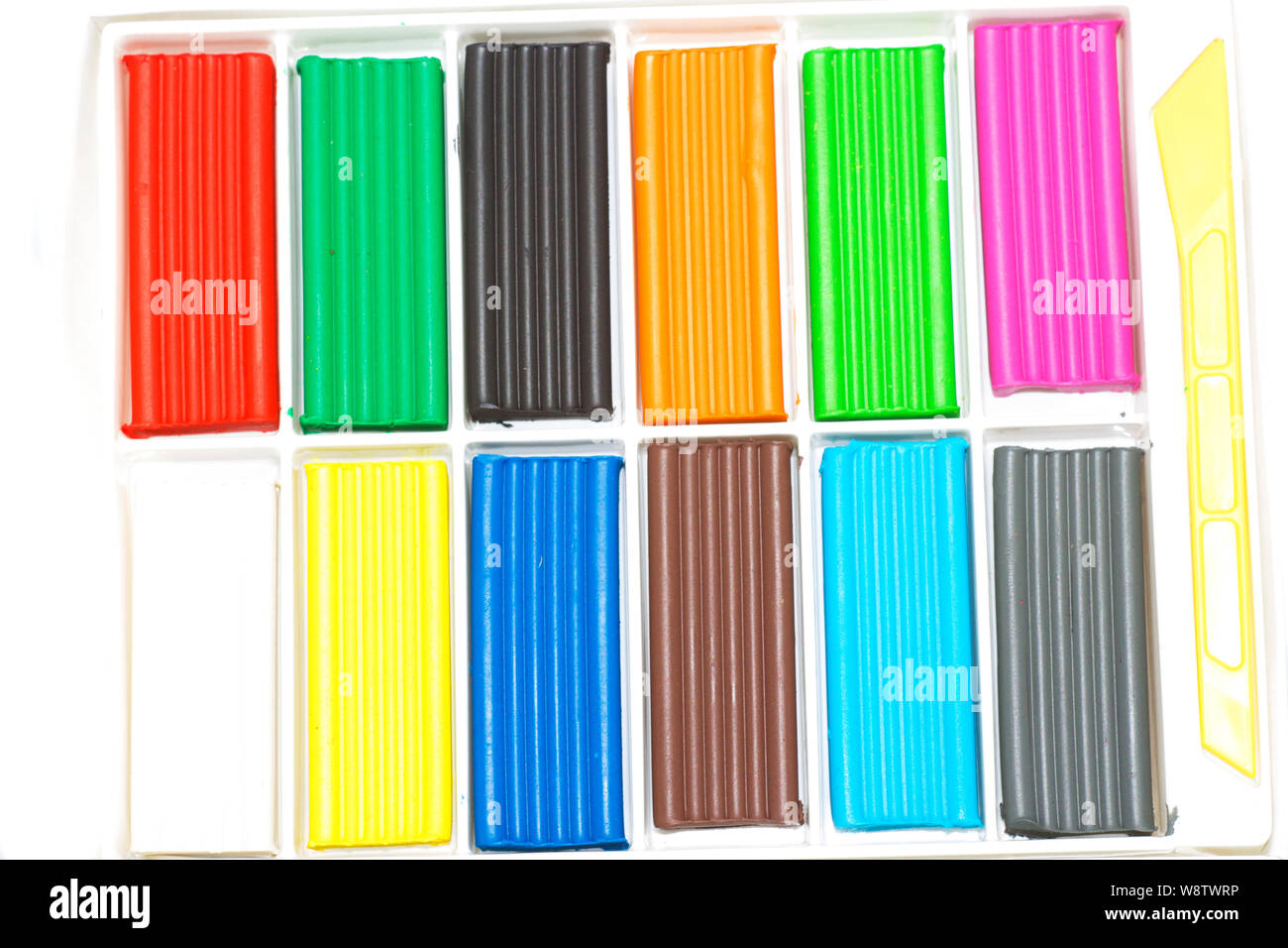 Colorful plasticine sticks isolated on white background Stock Photo - Alamy