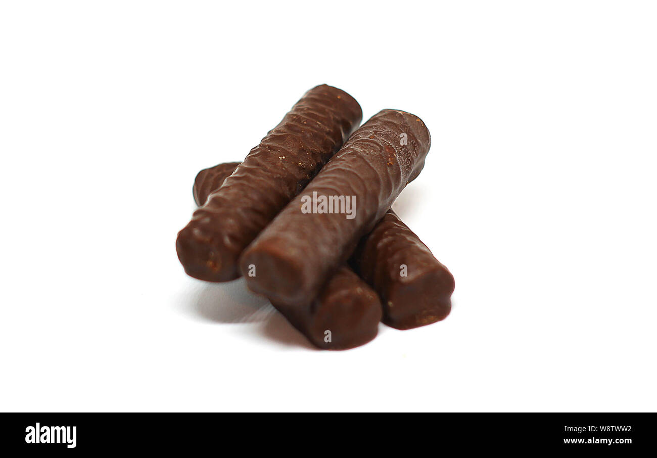 candy in chocolate isolated on white background Stock Photo - Alamy