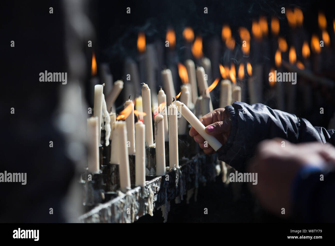 Group of candle burning in a religion event Stock Photo - Alamy