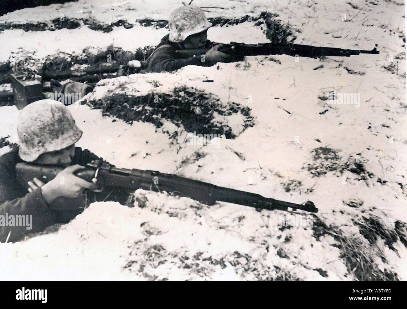 German Soldiers take up firing positions on the Russian Front . The ...