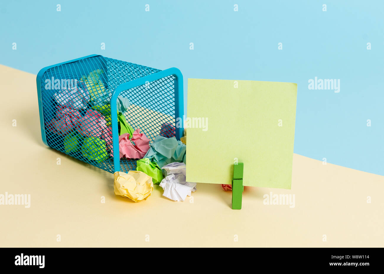 Trash bin crumpled paper clothespin empty reminder office supplies ...