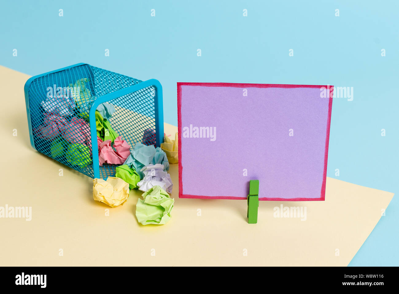 Trash bin crumpled paper clothespin empty reminder office supplies ...