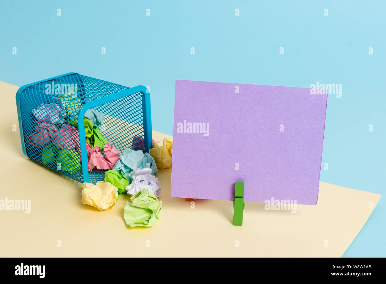 Trash bin crumpled paper clothespin empty reminder office supplies ...