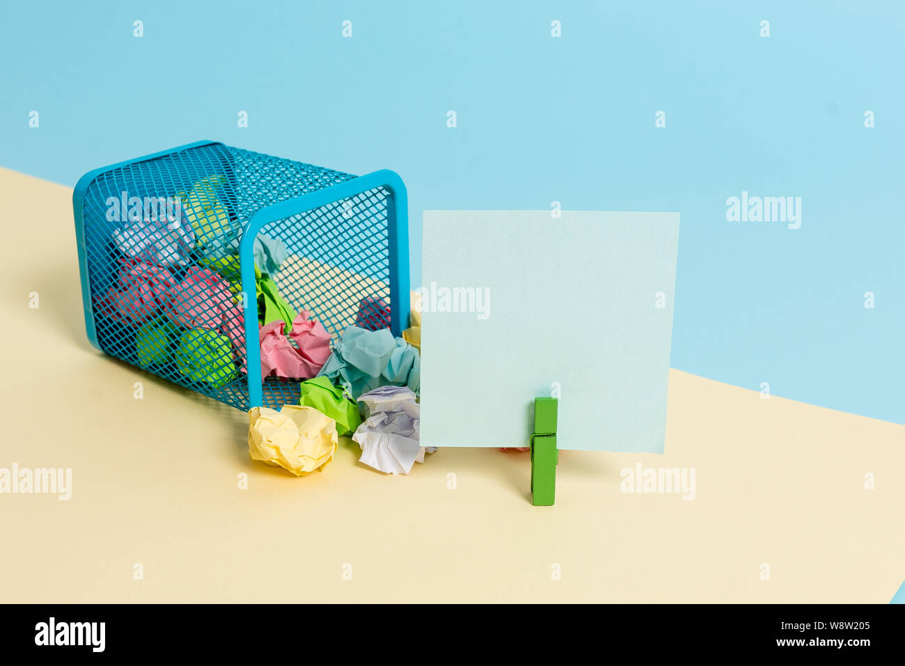 Trash bin crumpled paper clothespin empty reminder office supplies ...