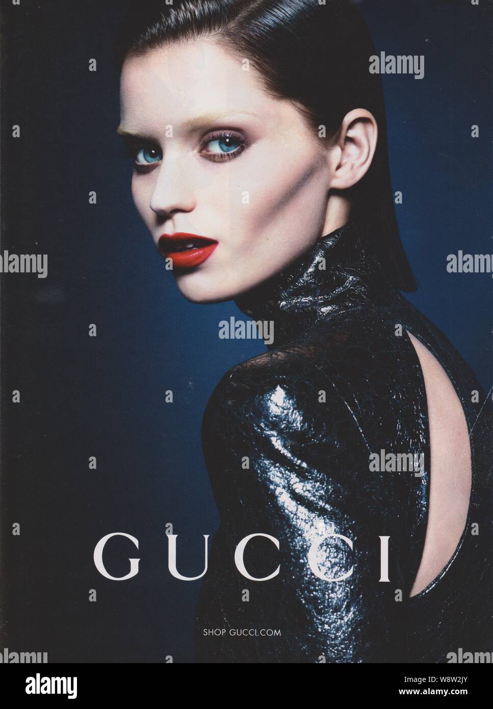 poster advertising GUCCI fashion house with Abbey Lee Kershaw paper ...