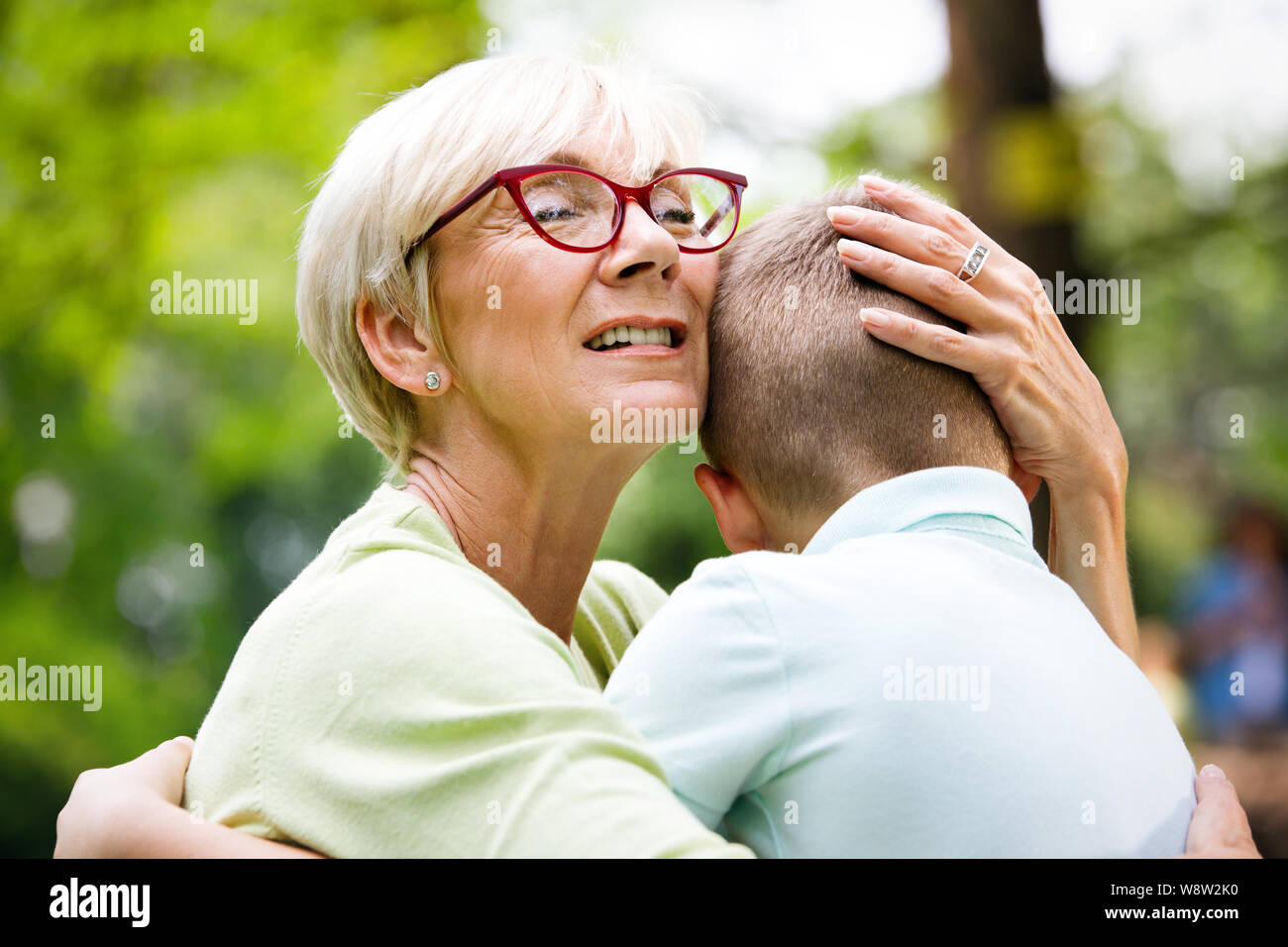 Grandma grandchild hug hi-res stock photography and images - Alamy