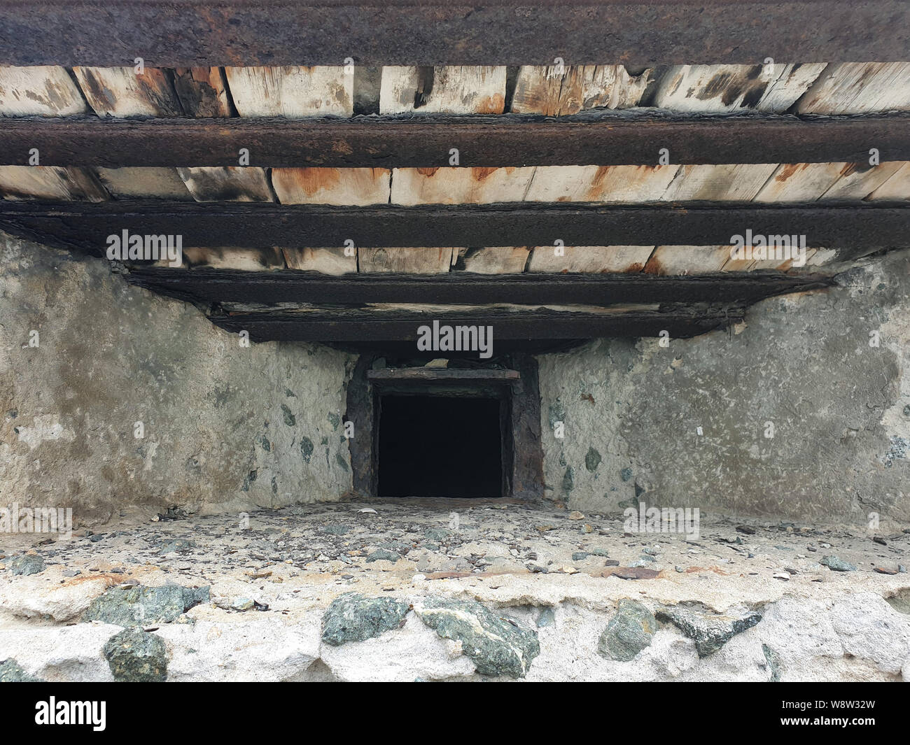 Loophole in concrete wall. Concrete bunker with embrasure Stock Photo ...