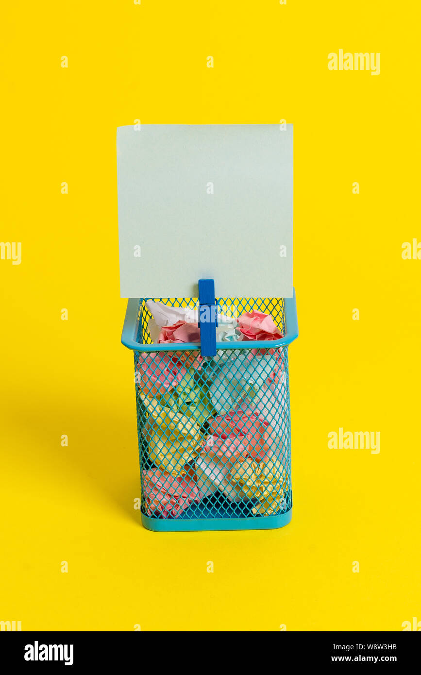 Trash bin crumpled paper clothespin empty reminder office supplies ...